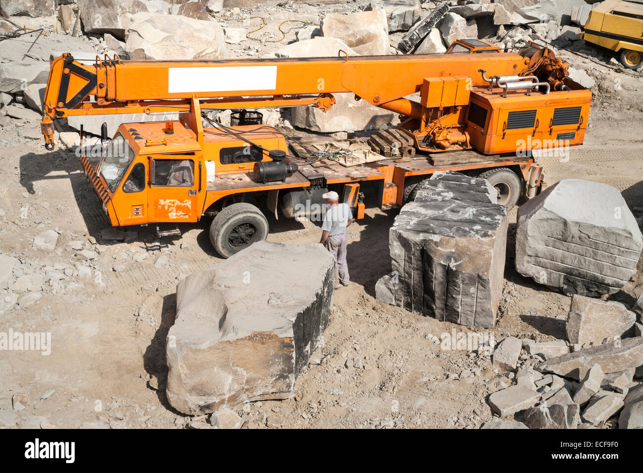 Granite quarry. Working mining machines. Mining industry Stock Photo ...