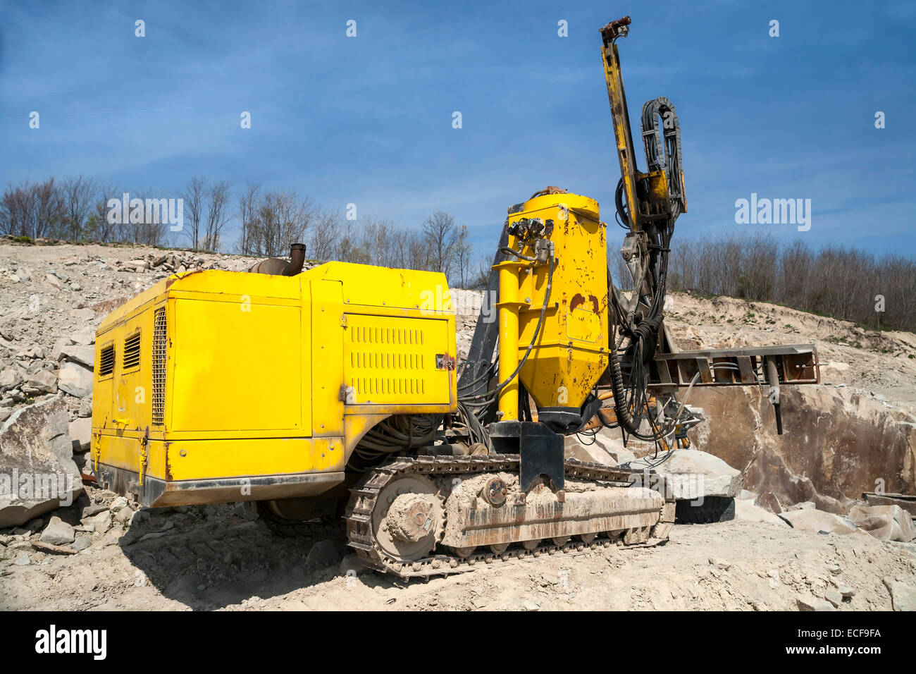 Granite quarry. Working mining machines. Mining industry Stock Photo ...