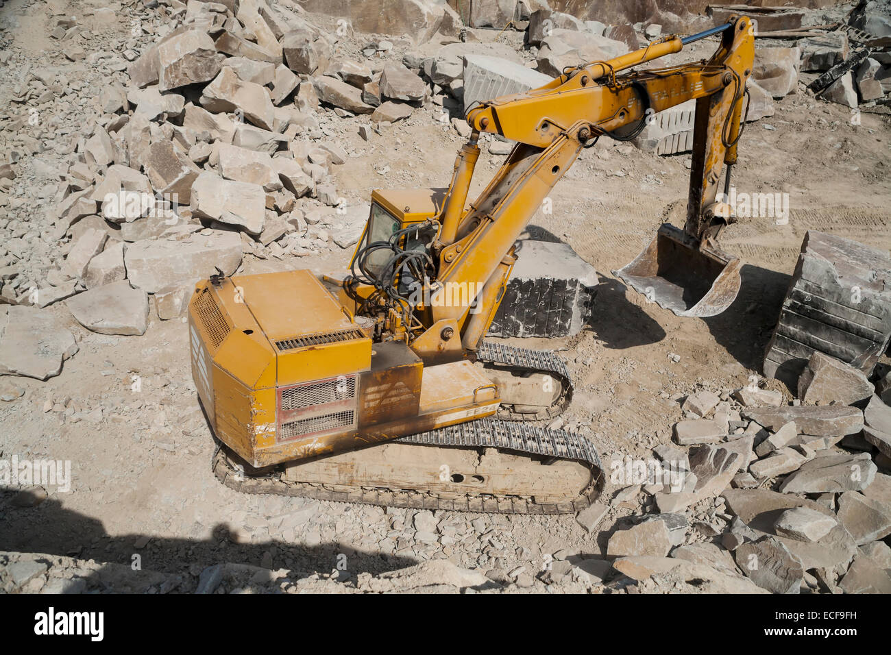 Granite quarry. Working mining machines. Mining industry Stock Photo ...