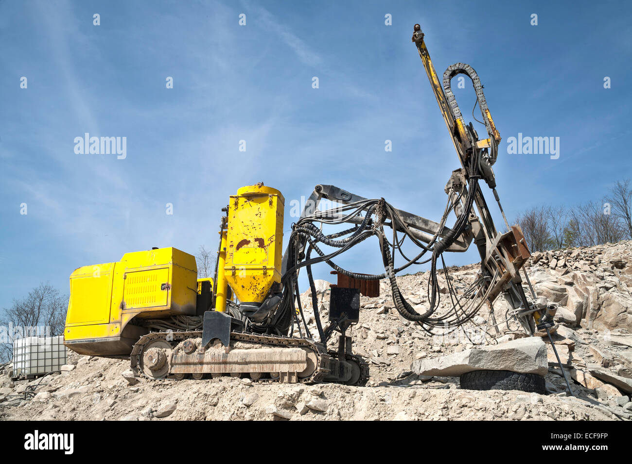 Granite quarry. Working mining machines. Mining industry Stock Photo ...