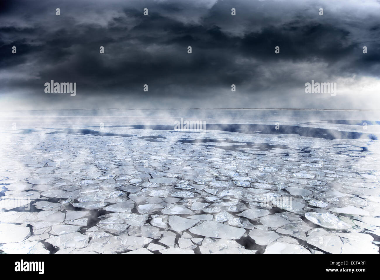 Winter seascape with dark clouds over frozen sea Stock Photo - Alamy
