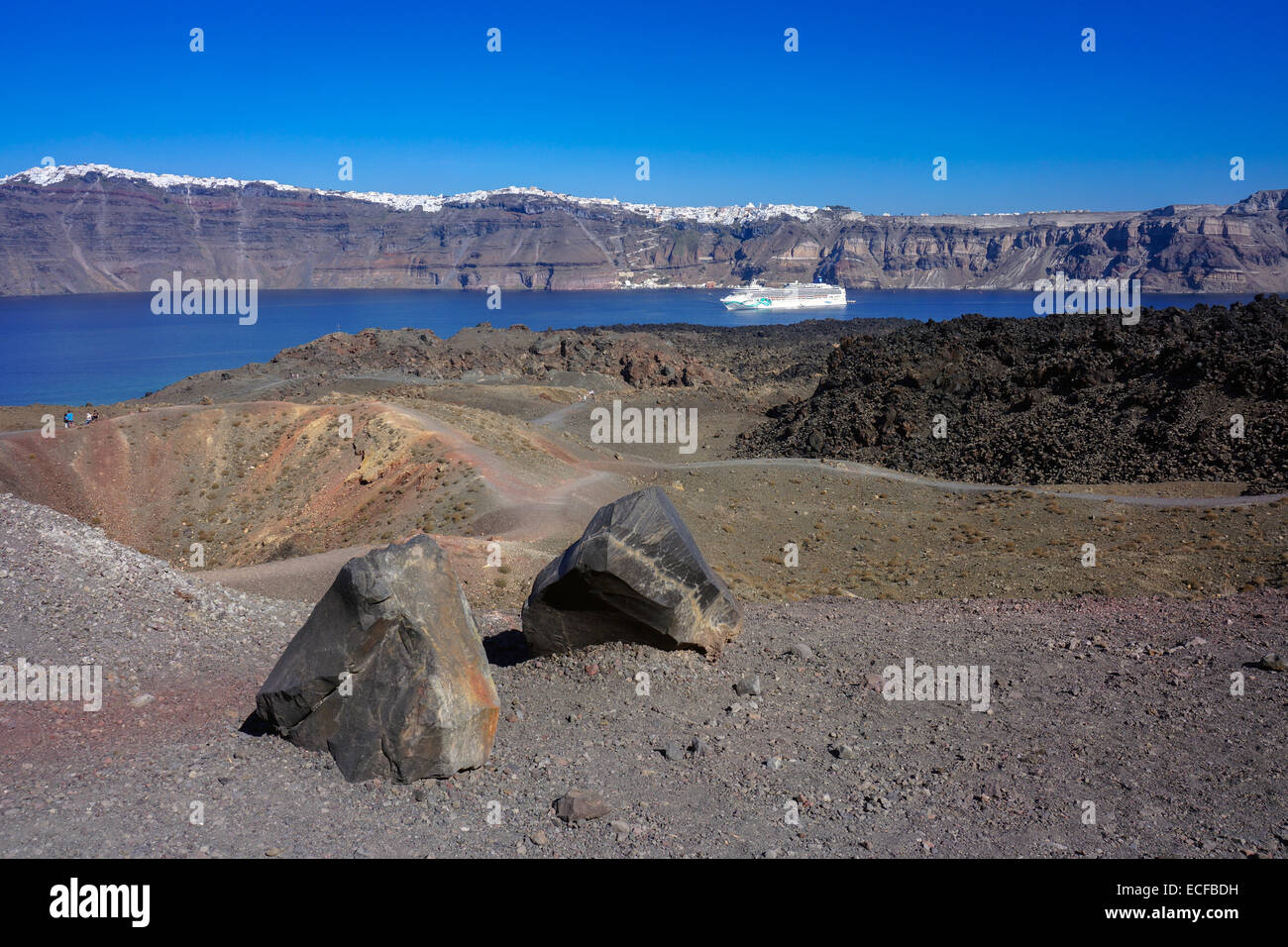 Nea Kameni volcanic lava island, Santorini, Greece, with Fira on the ...