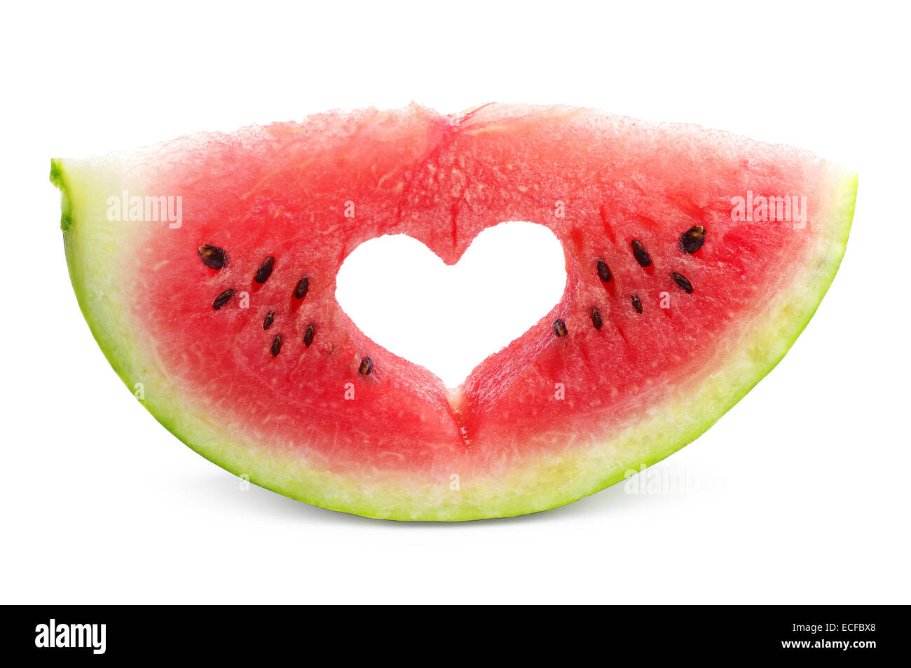 Watermelon slice with cut in the shape of heart on white background ...