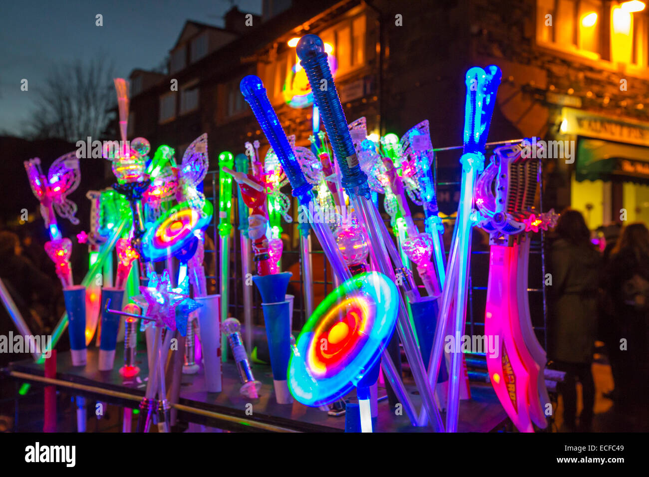 Neon light toys for sale at a stall in Ambleside, UK Stock Photo - Alamy