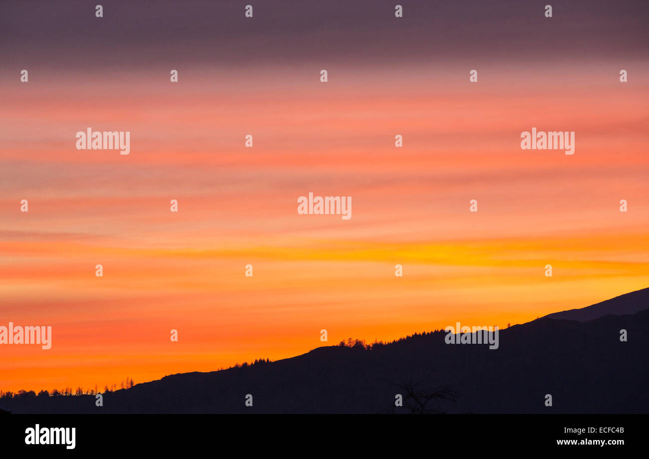 A sunset over the Coniston fells in the Lake District, UK Stock Photo ...