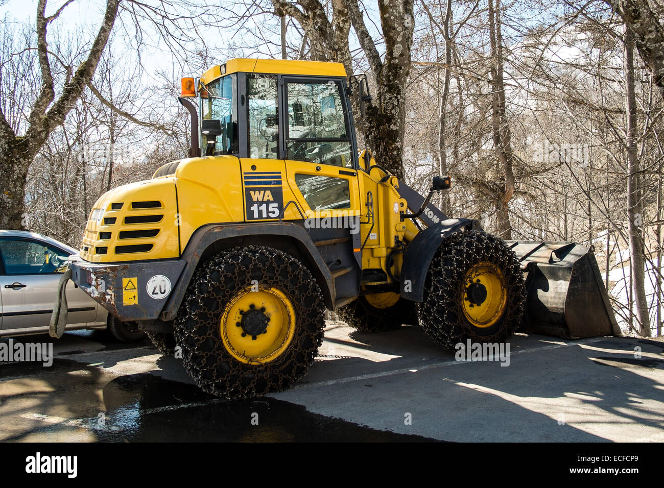 Yellow snow plow parked up at Alpe D'Huez ski resort Stock Photo - Alamy