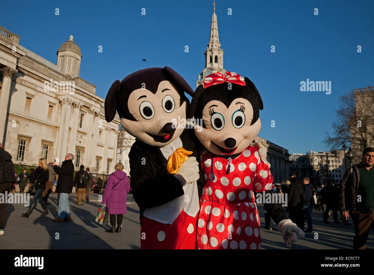 Mickey and Minnie Mouse enjoying the sunshine in Trafalgar Square Stock ...