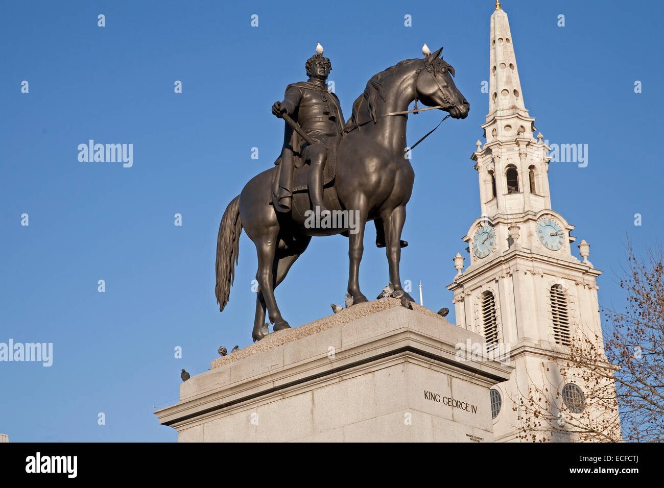 King George 1V statue under a clear blue sky in Trafalgar Square Stock ...