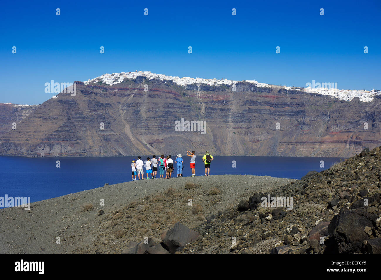 Nea Kameni volcanic lava island, Santorini, Greece, with Fira on the ...