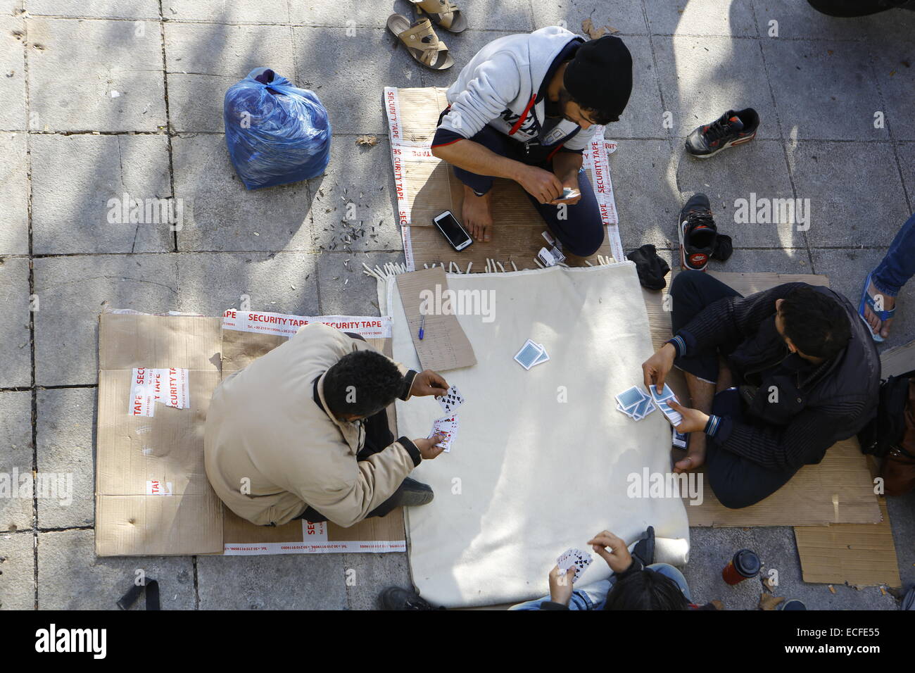 Athens, Greece. 13th December, 2014. A group of Syrian refugees play ...