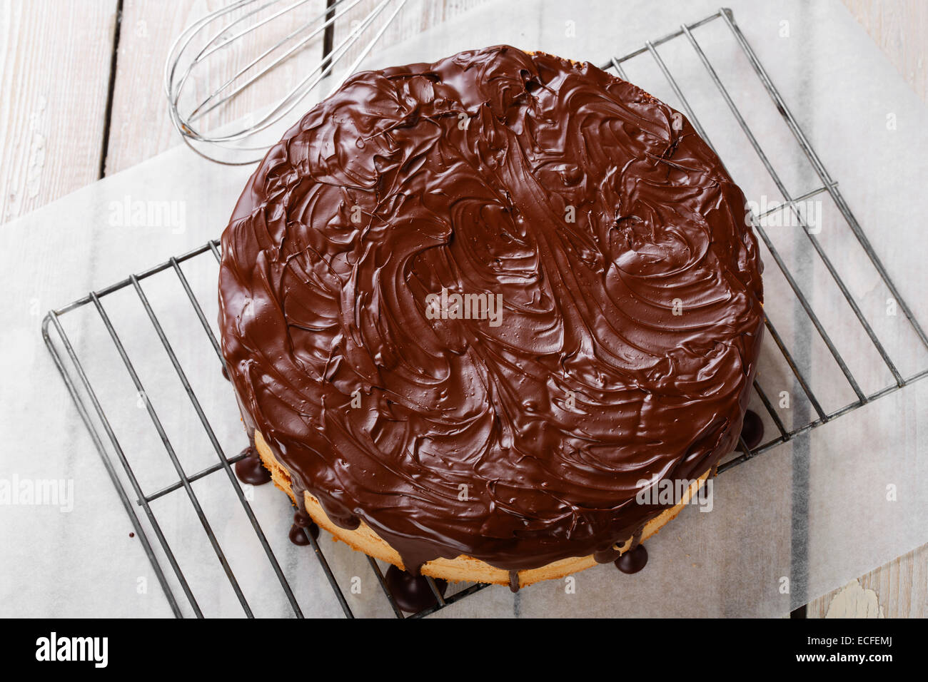 sponge cake covered in chocolate Stock Photo - Alamy