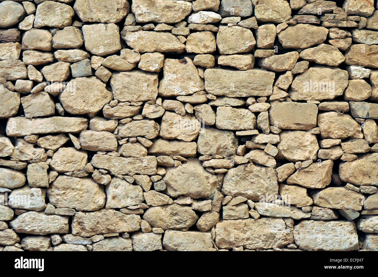 Stone brick wall background Stock Photo - Alamy