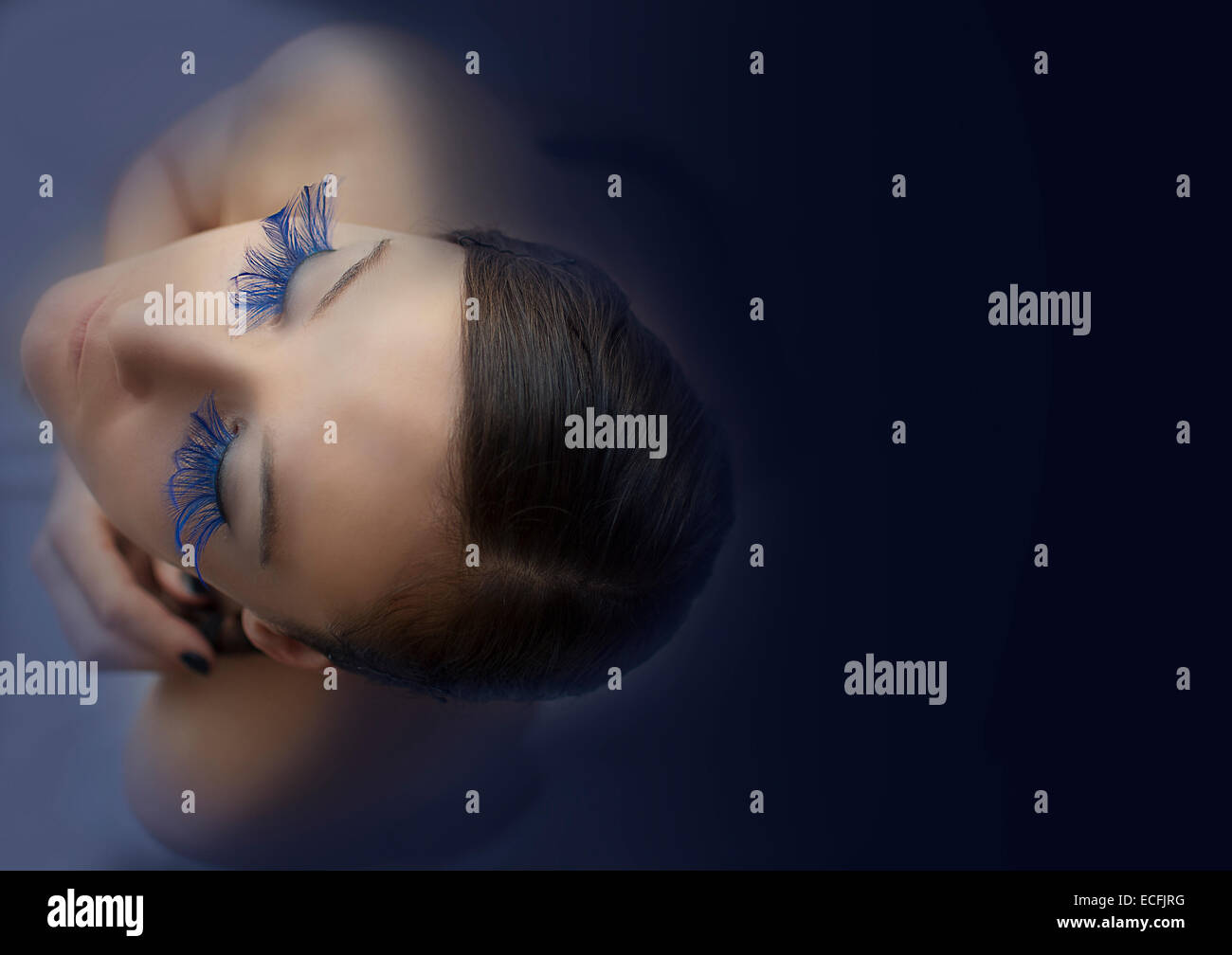 woman face bird view with false blue eyelashes Stock Photo - Alamy
