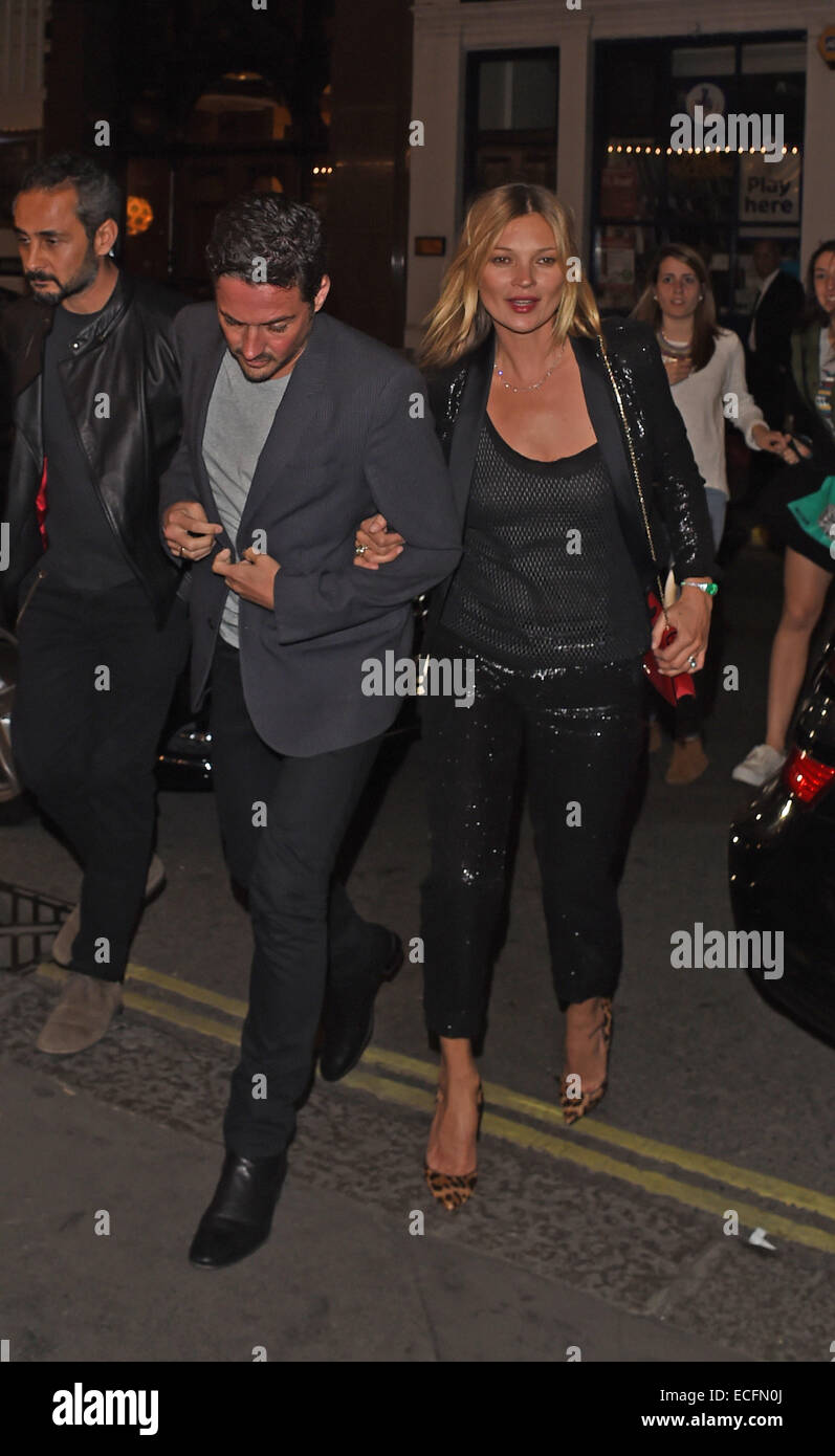 Kate Moss seen arriving arm in arm with david gardner as they arrived ...