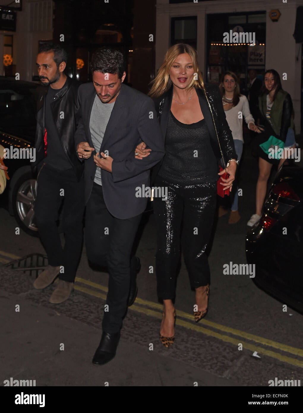 Kate Moss seen arriving arm in arm with david gardner as they arrived ...