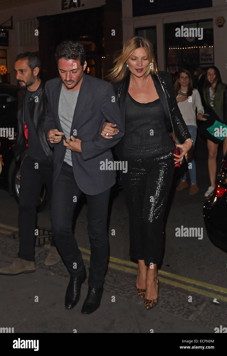 Kate Moss seen arriving arm in arm with david gardner as they arrived ...