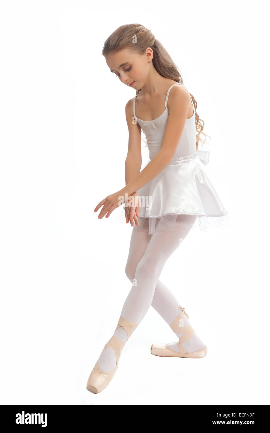 beautiful teen girl in white clothes ballet pose with long hair ...