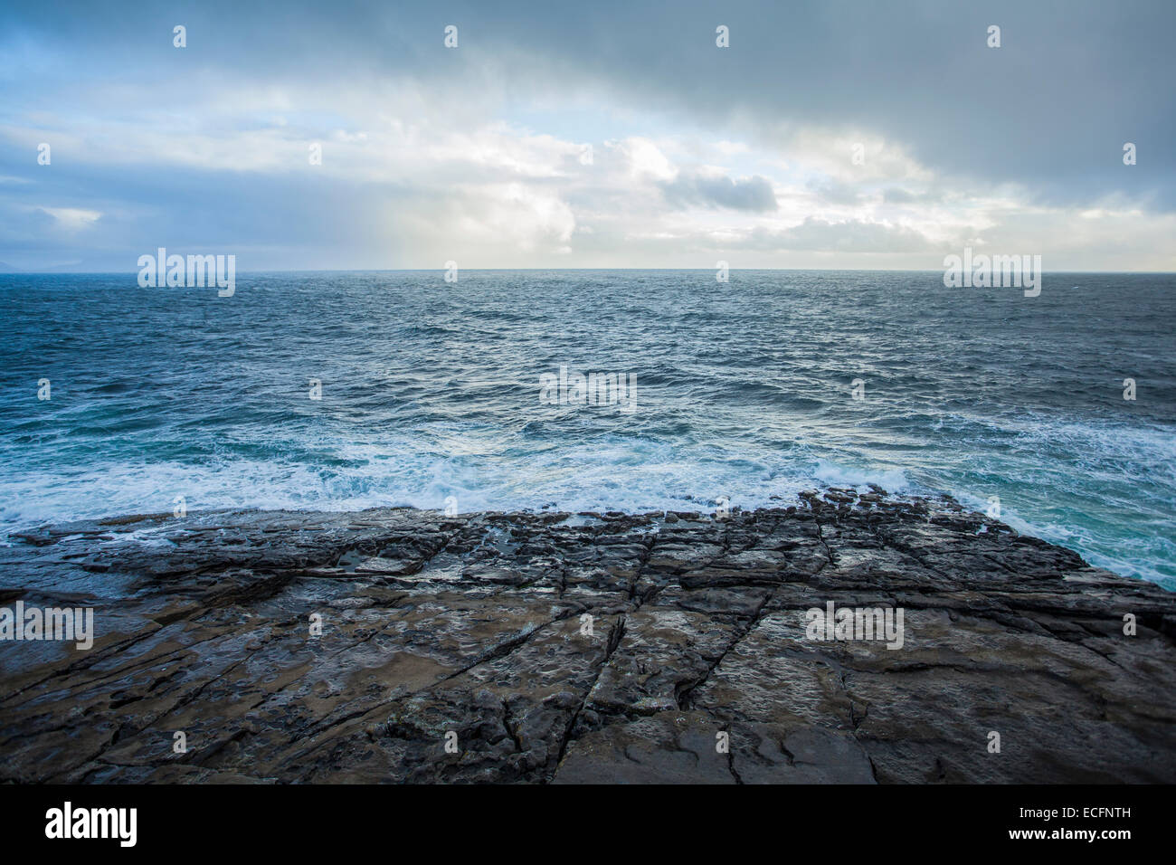Atmospheric seascape photograph of rock jutting into the Atlantic sea ...
