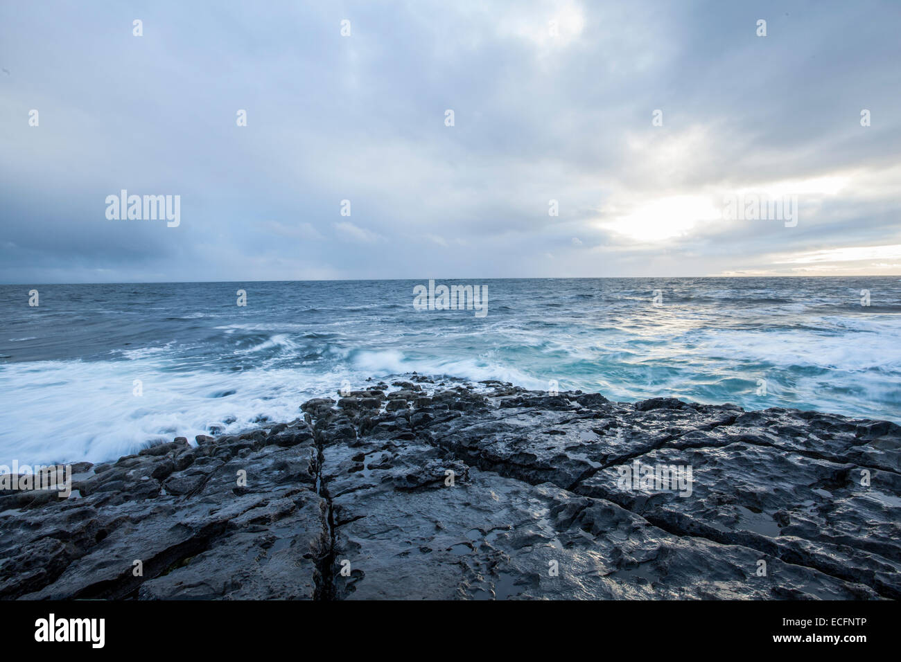 Atmospheric seascape photograph of rock jutting into the Atlantic sea ...
