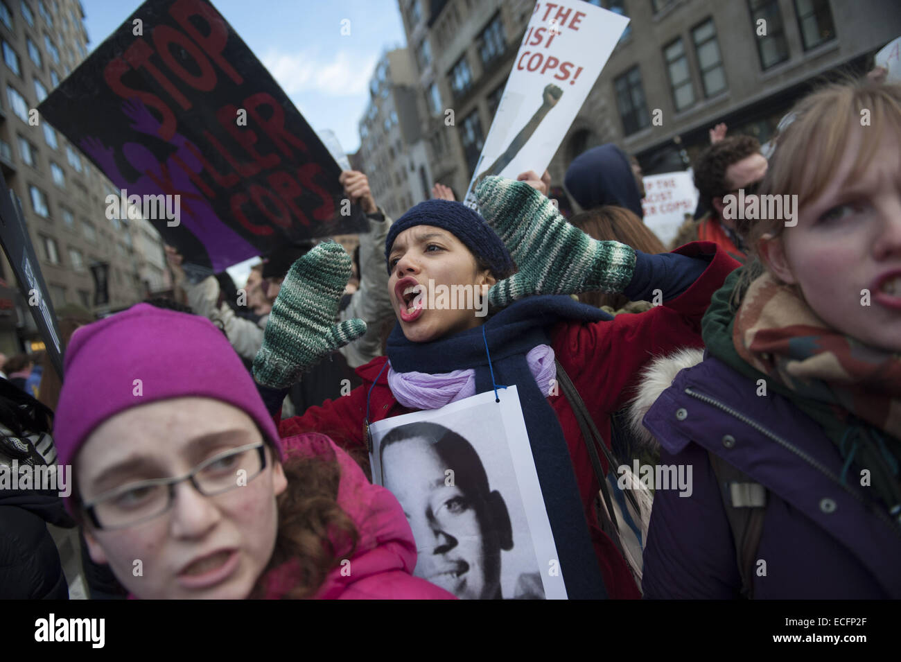New York, New York, USA. 13th Dec, 2014. Protestors march up Fifth ...