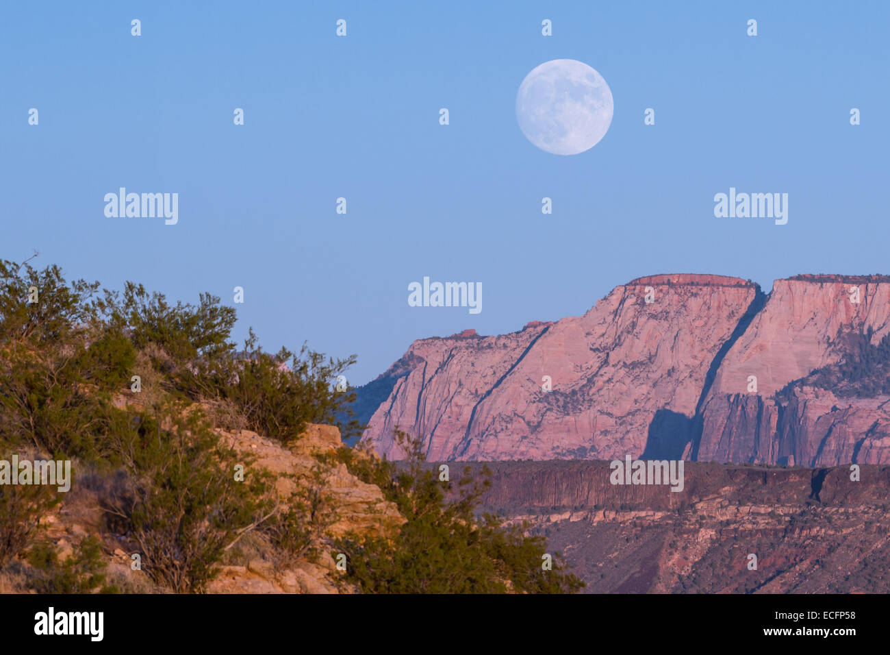 beautiful full moon rising over the mountains of southwestern Utah ...