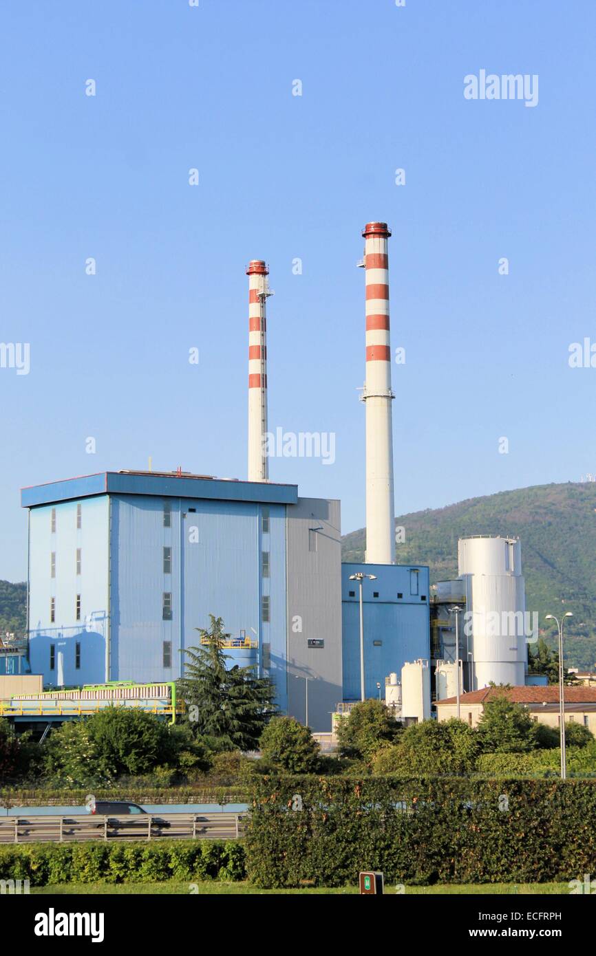 outside of the factory with smokestack in north Italy Stock Photo - Alamy