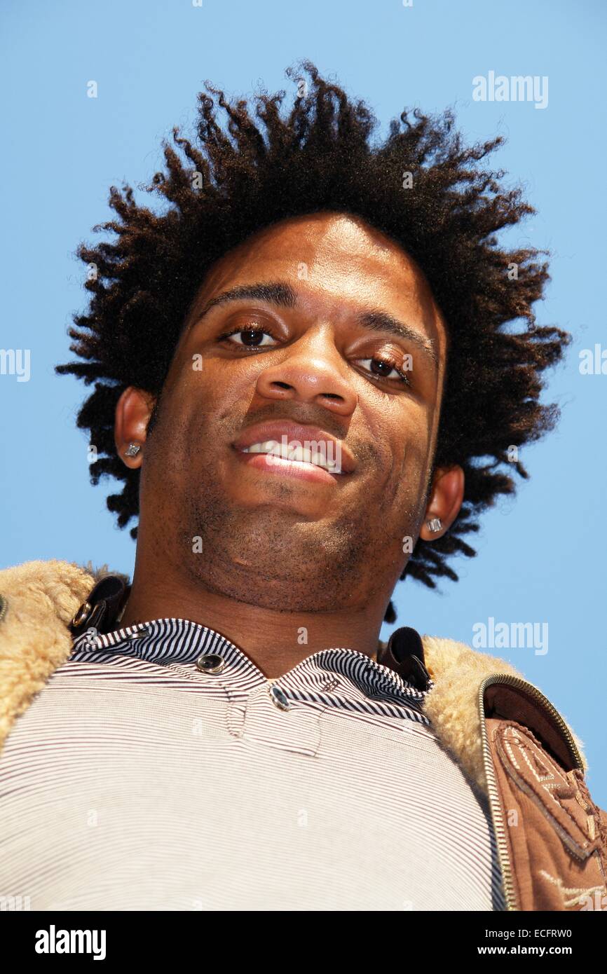 Portrait of a handsome young african man in the street Portrait of ...