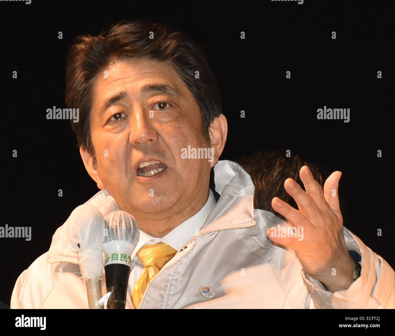 Tokyo, Japan. 12th Dec, 2014. Bundled up against the winter cold, Japan ...