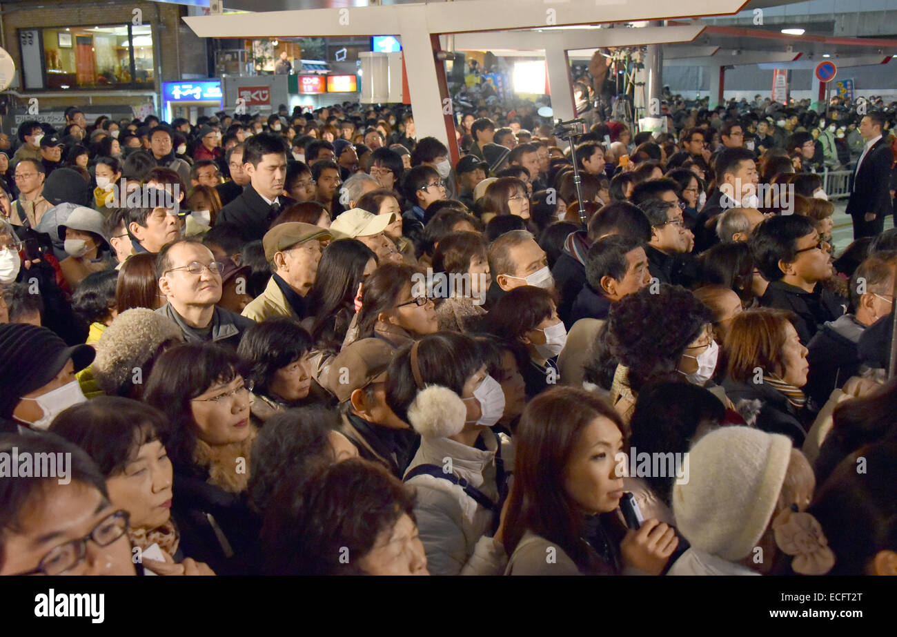 Tokyo, Japan. 12th Dec, 2014. Despite the cold weather, a huge throng ...