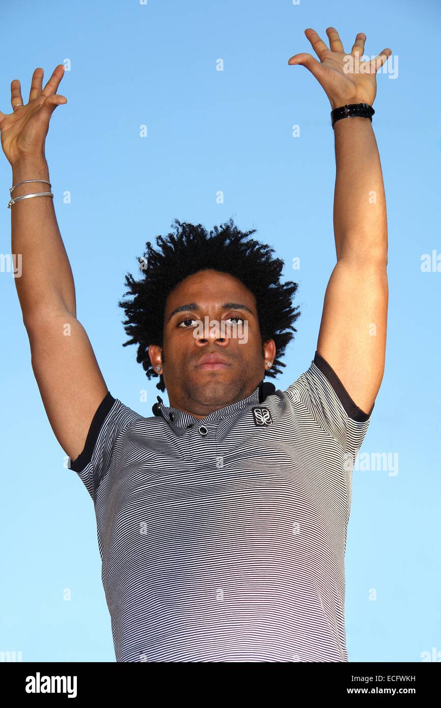 Portrait of a handsome young african man in the street Portrait of ...