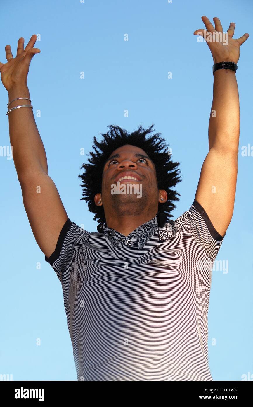 Portrait of a handsome young african man in the street Portrait of ...