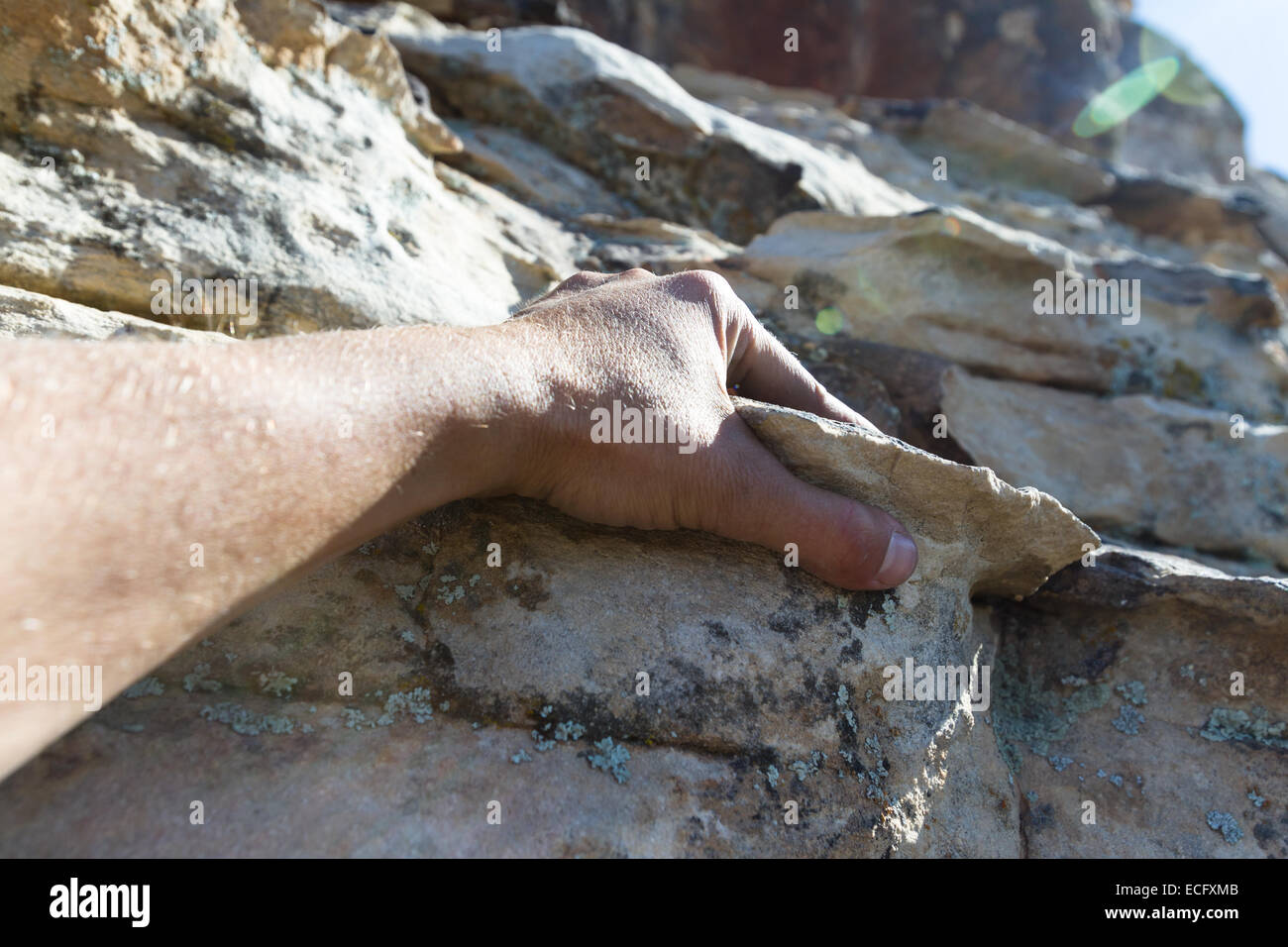 Hand gripping rock hi-res stock photography and images - Alamy