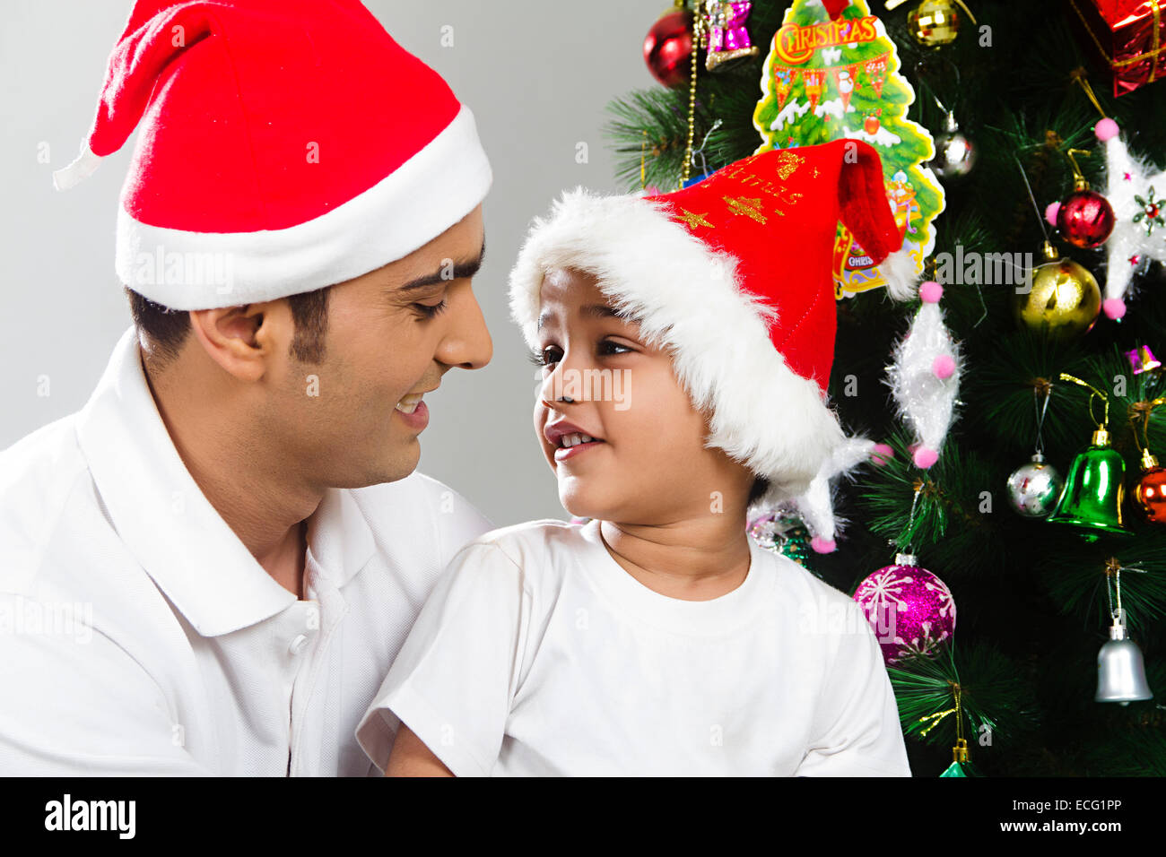 indian man with child Christmas Festival Stock Photo - Alamy