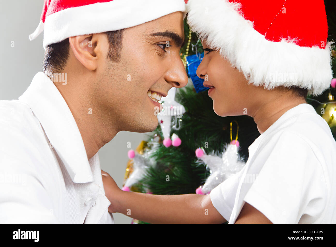 indian man with child Christmas Festival Stock Photo - Alamy