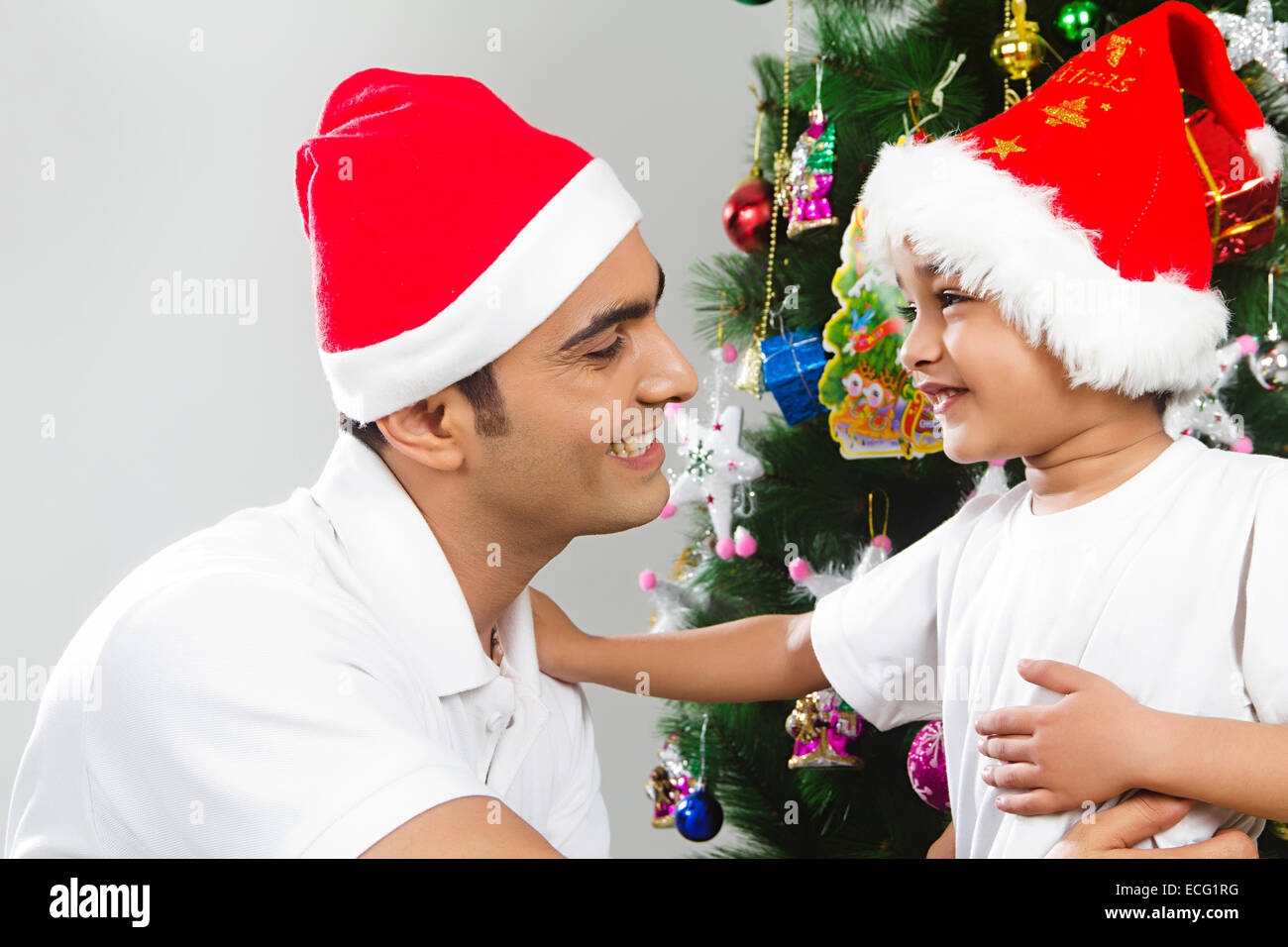 indian man with child Christmas Festival Stock Photo - Alamy