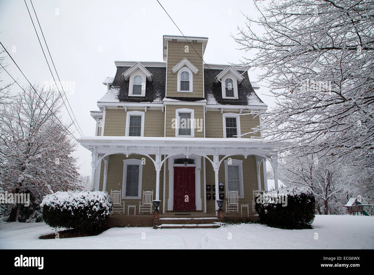 Colonial home covered with snow Stock Photo - Alamy