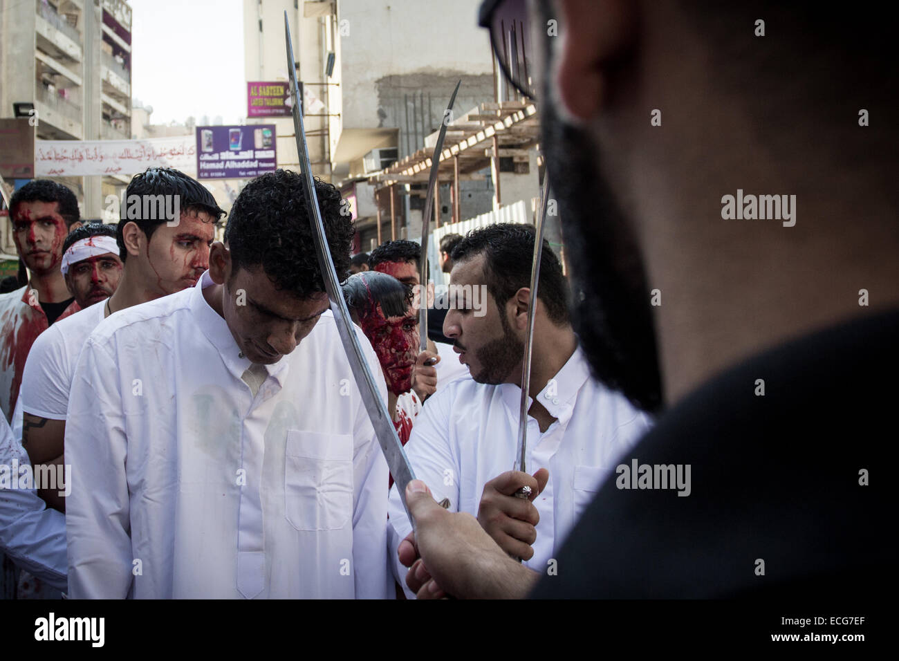 Male Shia Muslims take part in ceremonial chest beating parade as a ...