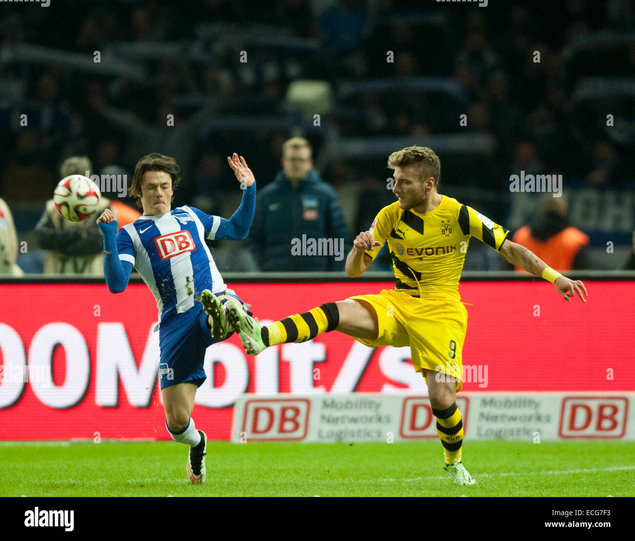 Berlin, Germany. 13th Dec, 2014. Dortmund's Ciro Immobile (R) vies for ...