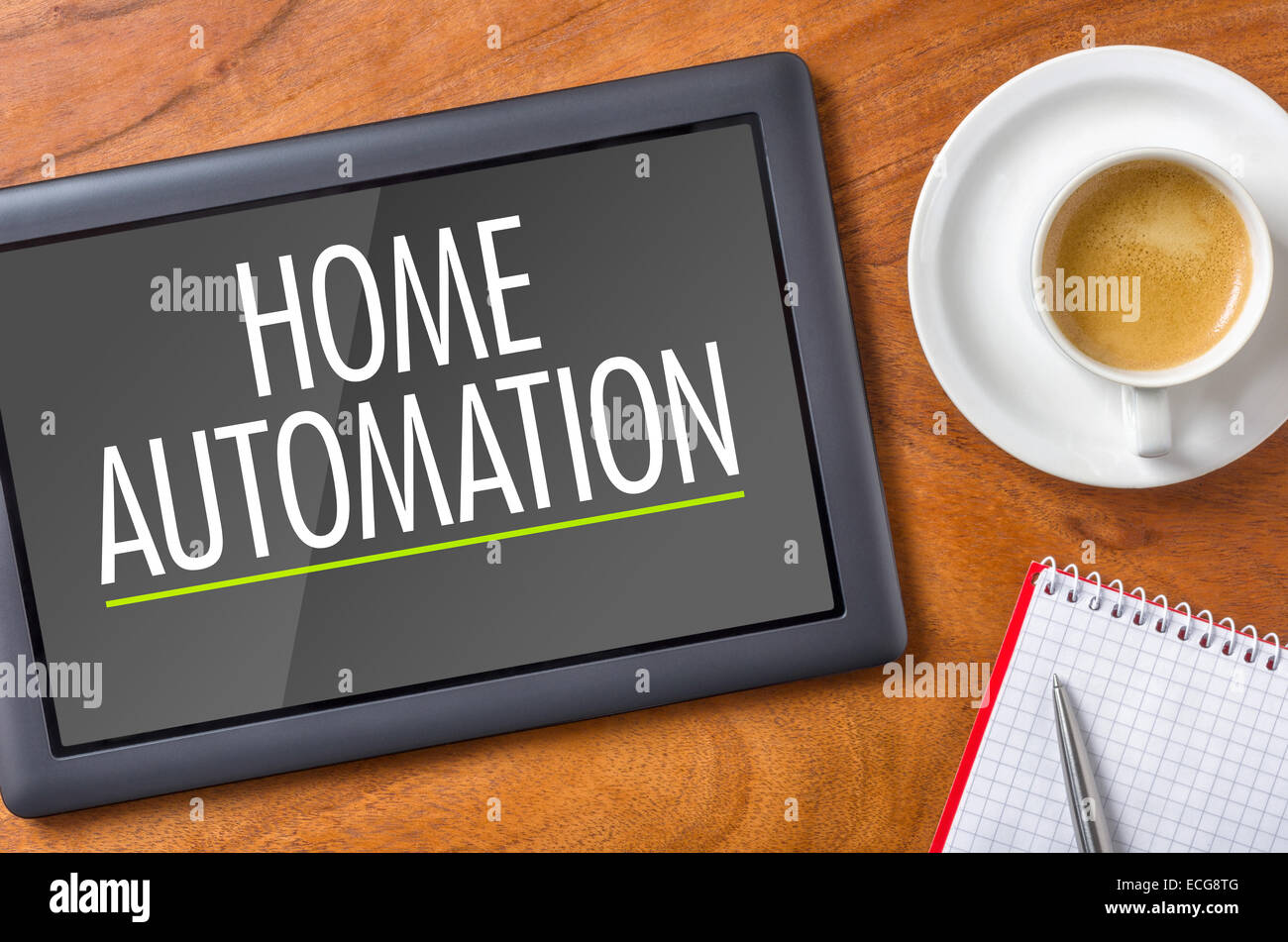 Tablet on a desk - Home Automation Stock Photo - Alamy