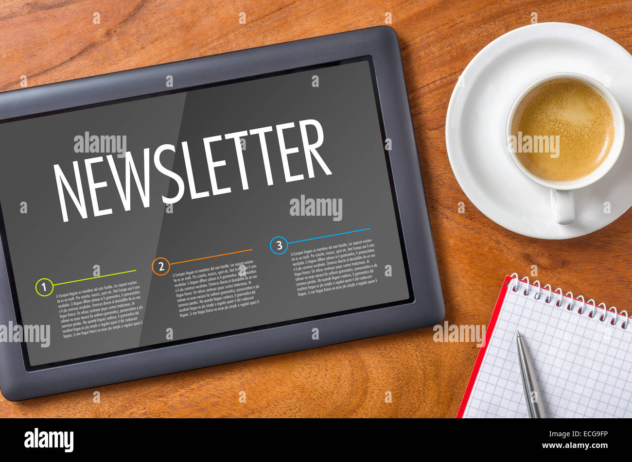 Tablet on a desk - Newsletter Stock Photo - Alamy