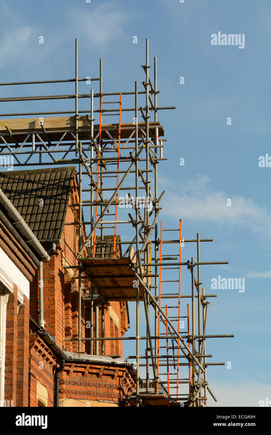 Scaffolding around house Stock Photo - Alamy