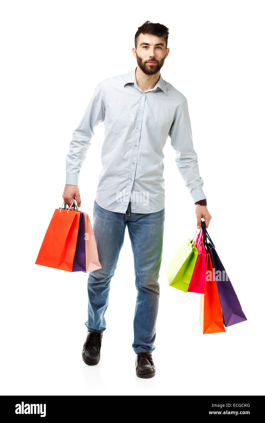 Handsome man holding shopping bags. Christmas and holidays concept ...