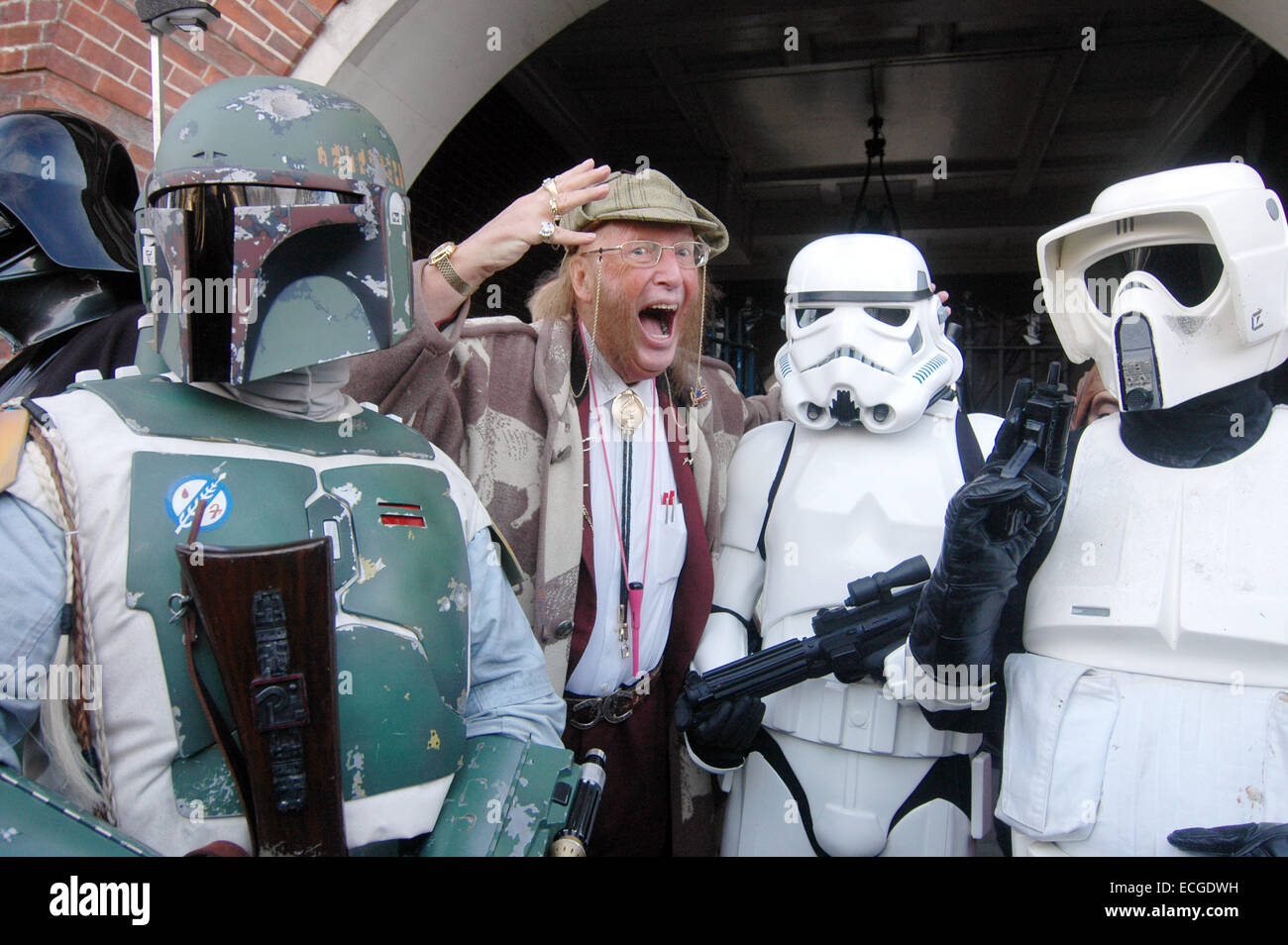 London, UK. 14th December, 2014. John McCririck with stormtroopers ...