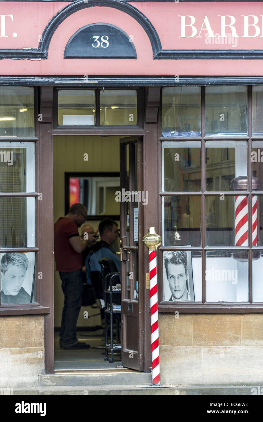 A traditional barbers shop on the High Street, Oxford City centre, UK ...
