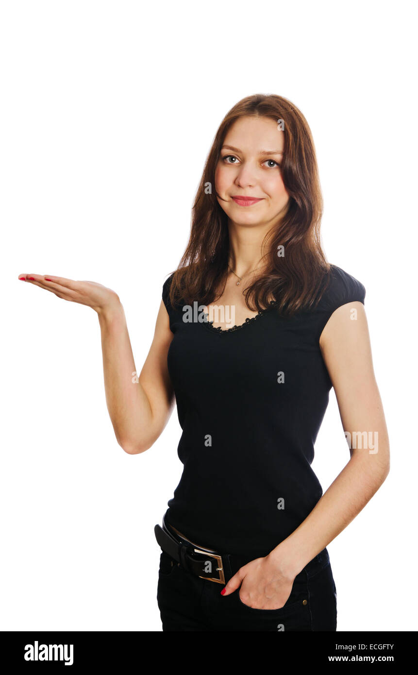 Portrait of pretty young woman holding her hands out and presenting ...