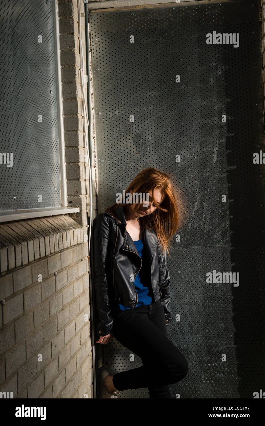 Victim of abuse: A sad depressed solo redhead ginger haired young woman ...