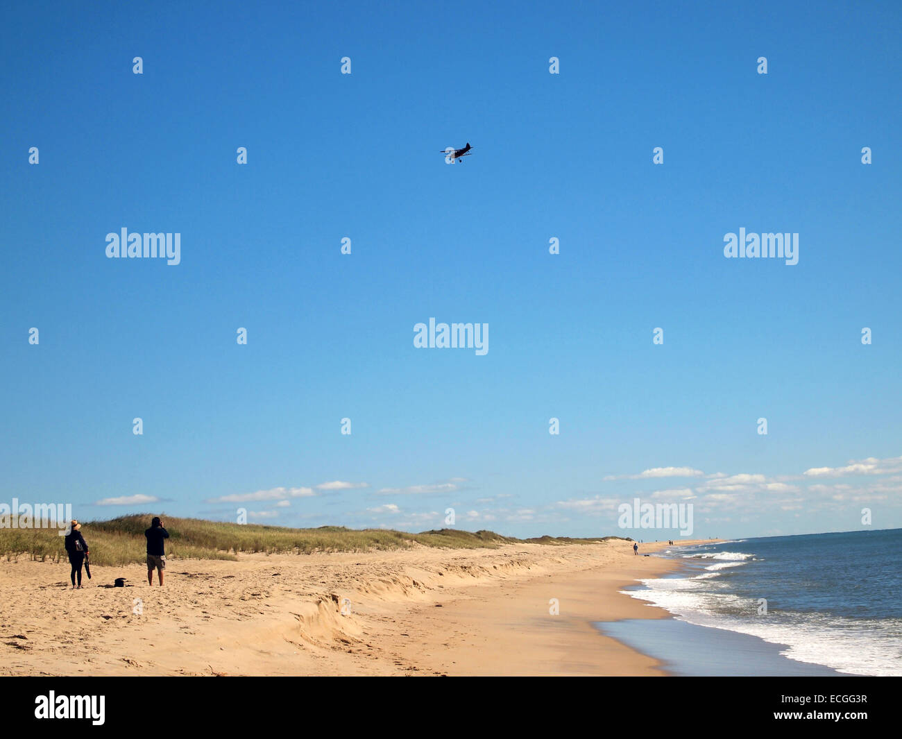Bi Plane flying above a beach on Marthas Vineyard, Cape Cod, USA Stock ...