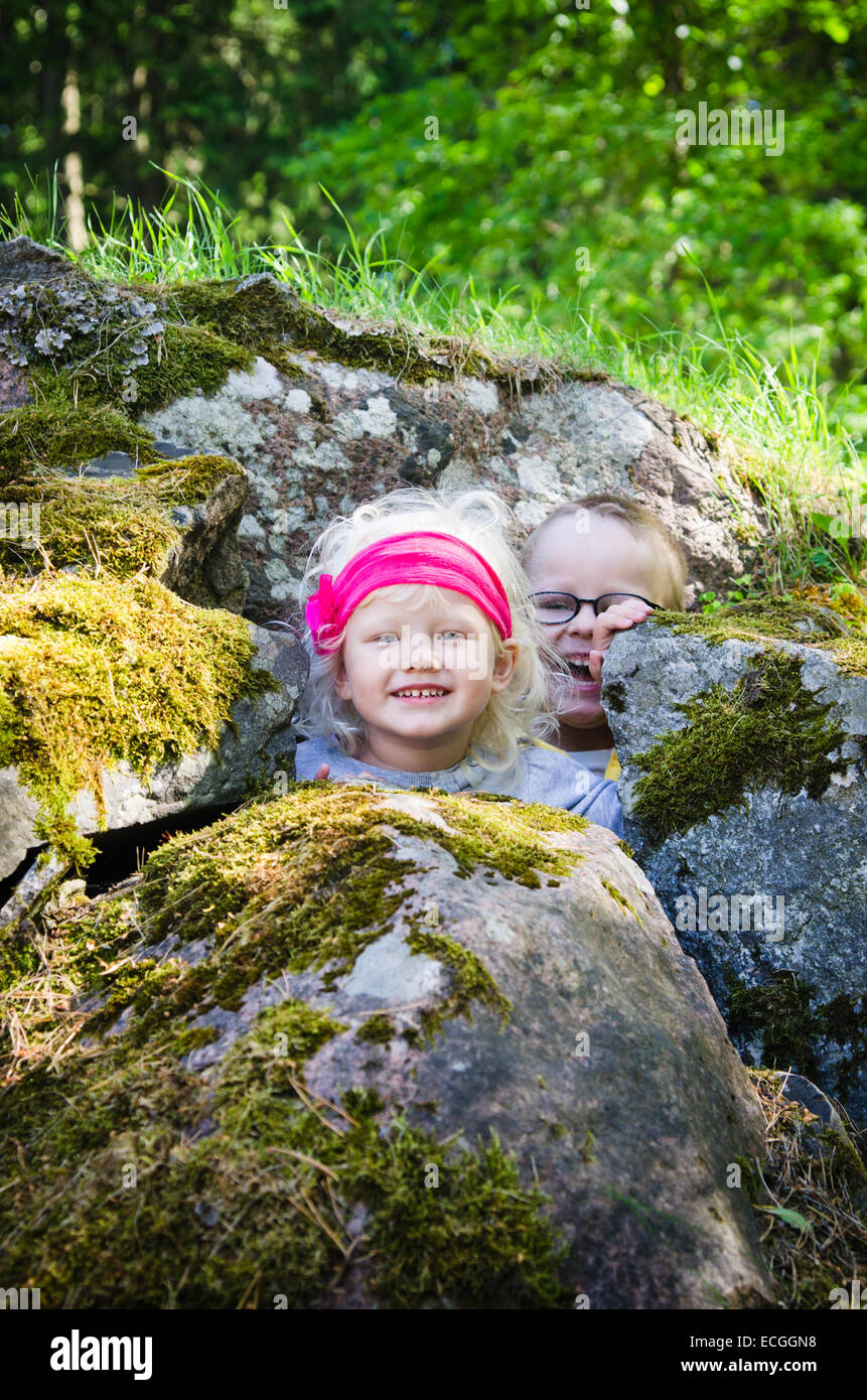 Children hiding outside hi-res stock photography and images - Alamy