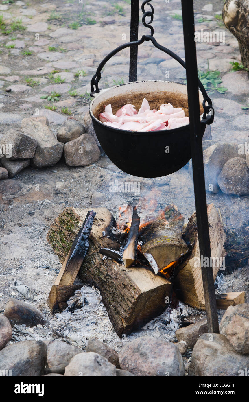 Old pot cooking over campfire hi-res stock photography and images - Alamy