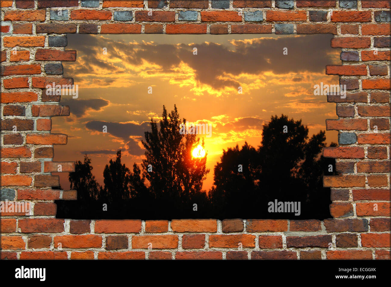 broken brick wall and view to the beautiful sunset with silhouettes of ...
